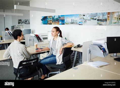 Conversation Of Businesswomen Stock Photo Alamy