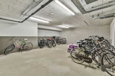 A Large Room Filled with Bikes in a Garage Editorial Image - Image of ride, bicycle: 271403240