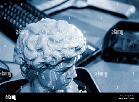gray human head on 3d printed close up an object prototype of a human