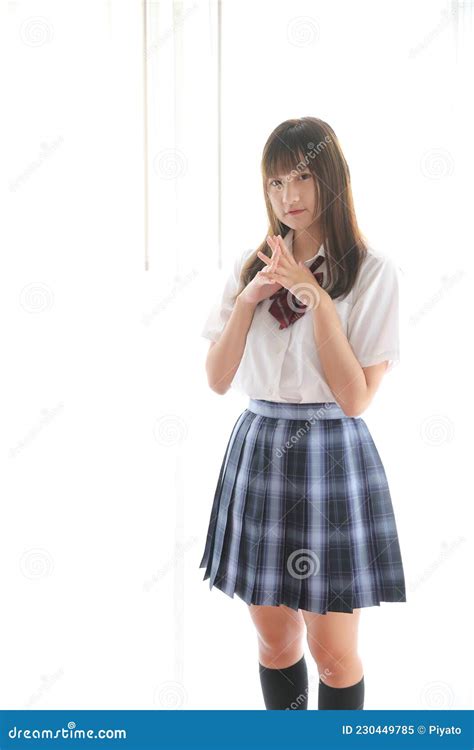 Portrait Japanese School Girl Uniform In White Tone Bed Room Stock