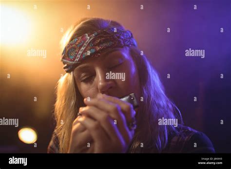 Girl Playing Harmonica High Resolution Stock Photography And Images Alamy