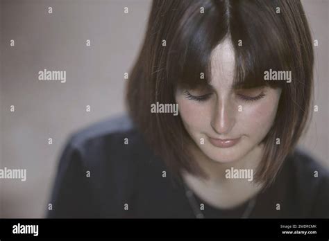 Pensive Portrait Of A Pretty Short Haired Brunette Girl Looking