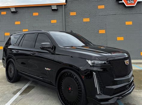 Montanas Cadillac Escalade V A Blacked Out Luxury Suv With 30 Inch