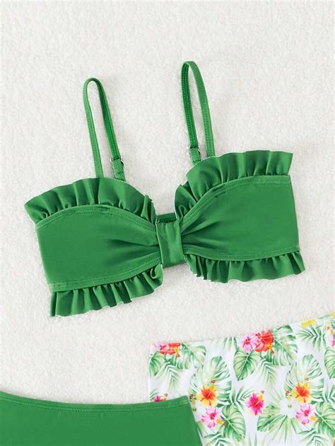 Young Girl Bikini Set With Ruffle Trim Detailing And Tropical Print Swim