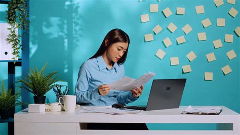businesswoman cross referencing data stock footage sbv 347684089