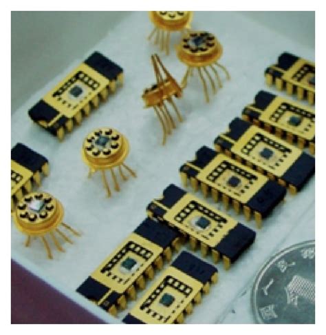 The Photos Of Microhotplate Gas Sensor Arrays A Sem Photo Of A