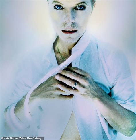 David Bowie Is Suspended From The Ceiling And Wrapped In Bandages In