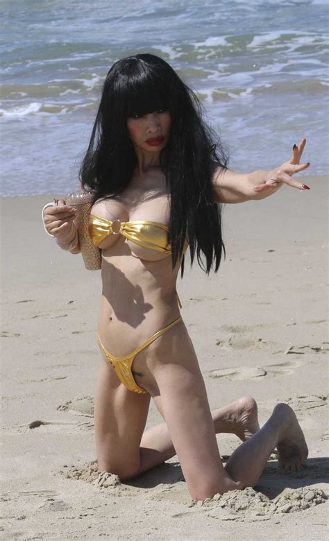 Bai Ling Shows Off Her Style In A Gold Bikini At Hermosa Beach In Los