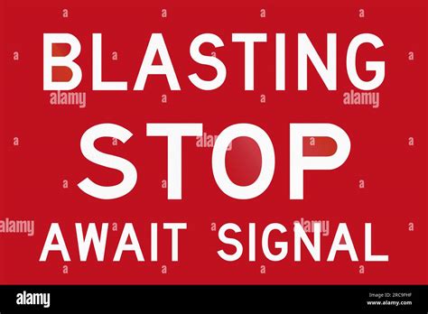 An Australian Temporary Road Sign Blasting Stop And Await Signal