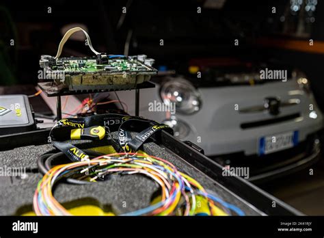 Rome, Italy 29 september 2022: Tuning Car Ecu electronic. Detail of Car ecu bench reading method ...