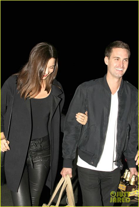 Miranda Kerr And Evan Spiegel Couple Up At Kanye West Concert Photo