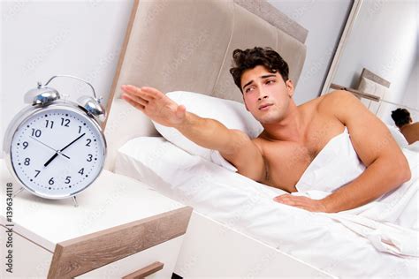 Man Having Trouble Waking Up In Morning Stock Photo Adobe Stock