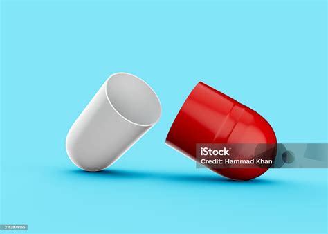 3d Red And White Open Pharmaceutical Antibiotic Capsule On Soft Blue
