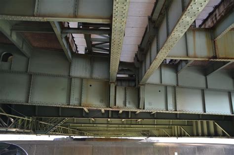 Premium Photo Underneath View Of Metallic Bridge
