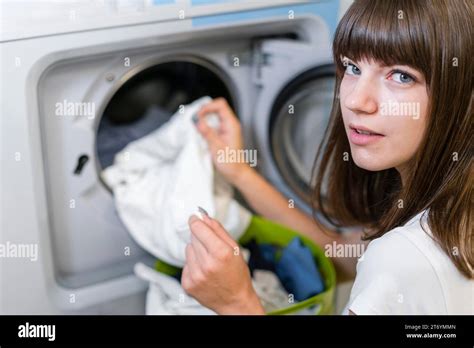 Portrait Cute Woman Doing Laundry Stock Photo Alamy