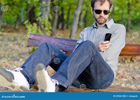Man Sending Sms Stock Photo Image Of Autumn Relaxation 29561282