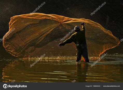 Fisherman Throwing Fishing Net Stock Photo Artistiko 158664524
