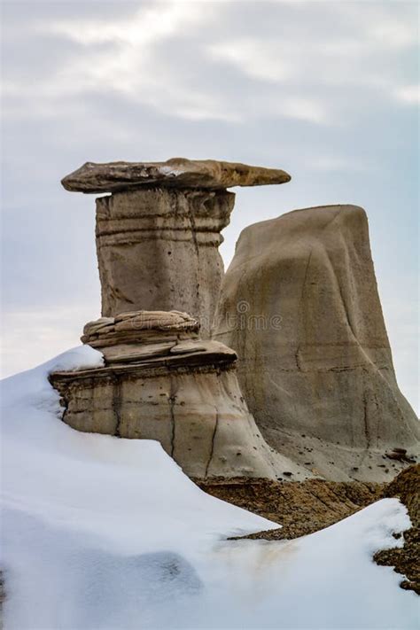 Winter Clings To The Hoodoos As Spring Arrives In The Badlands Drumheller Alberta Canada Stock