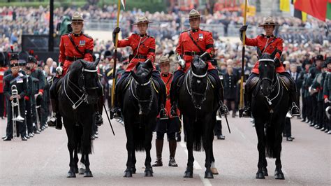 Everything We Know About The Canadian Mounties Who Led Queen Elizabeth