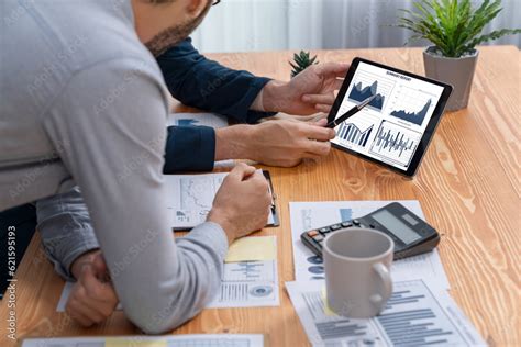 Busy Analyst Team In Office Analyzing Financial Data Analysis For Marketing Strategy In