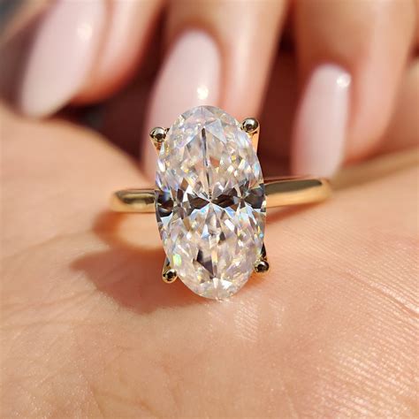 Moval Engagement Ring In Classic Solitaire Style Settings