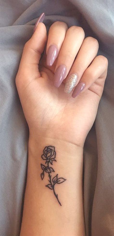 Elegant Small Rose Tattoo Designs On Hand Timeless Beauty In Minimal Space