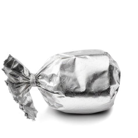 Premium Ai Image Silver Candy Sweet Sugar In White Background