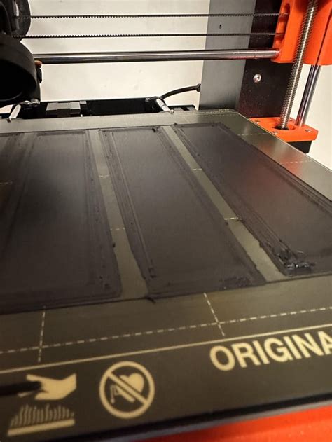too much filament corners not adhereing but good adhesion elsewhere