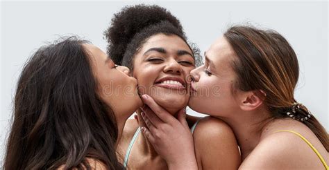 Close Up Of Happy Young Women In Colorful Underwear Kissing Their