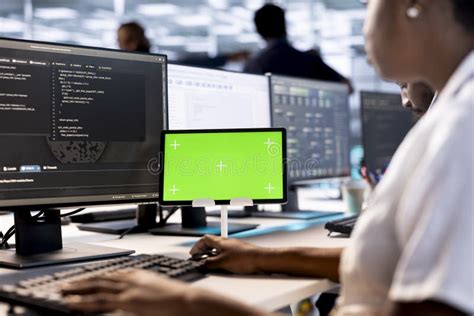 System Administrator Using Mockup Device To Look For Errors Stock Image