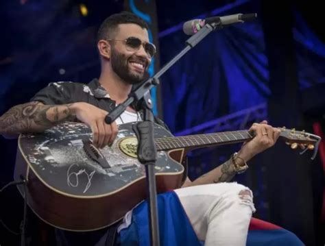 Gusttavo Lima Leiloa Violão Autografado Para Doar Ao Rio Grande Do Sul