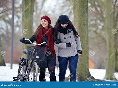 Two Beautiful Women On A Chilly Day At The Park Stock Image Image Of