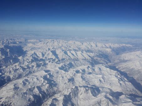 Free Images Sea Coast Snow Cloud Wave Mountain Range Flight Weather Arctic Plateau
