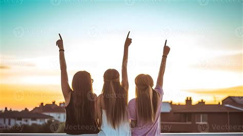 Three Girl Friends Share Joyful Moment And Happiness At Sunset