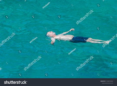 Man Floating In The Sea Stock Photos Images Photography Shutterstock