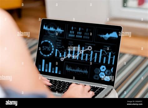 Woman Sitting With Laptop Back View Actively Accomplishing Work From