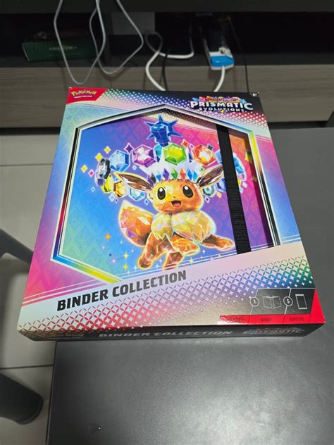 Prismatic Evolution Binder Hobbies And Toys Toys And Games On Carousell