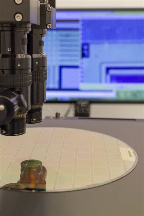 Silicon Wafer On Machine Process Examining In Microscope Stock Image