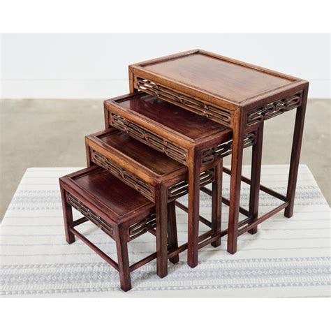 Set Of Four Diminutive Chinese Export Hardwood Nesting Tables Chairish