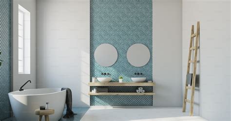 파란색 모자이크 흰색과 파란색 바닥 타원형 욕조 더블 세면대 및 두 개의 원형 거울이 있는 흰색 욕실 내부 3d 렌더링 모형 사진 Unsplash의 안전 이미지