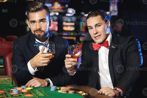 Rich And Handsome Guys Drinking Cognac And Playing Roulette In The