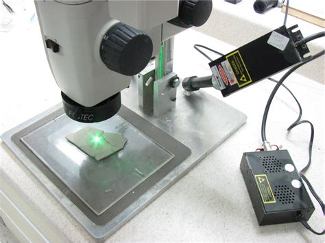 Laser Mounted On A Stereo Microscope A 532 Nm Green Laser Mounted To