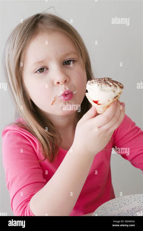 Indoor Picture Of The Pretty Girl With Ice Cream Stock Photo Alamy