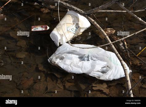Garbage Floating In Water Stock Photo Alamy