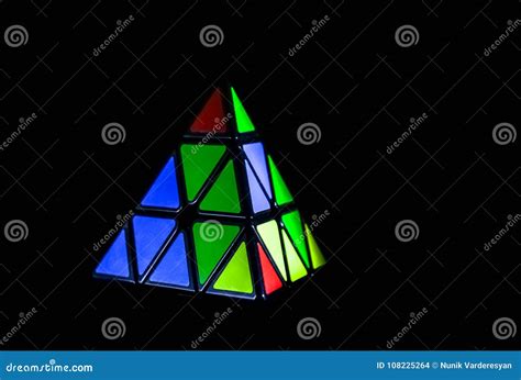 Triangular Rubik`s Cube On Black Background Editorial Image