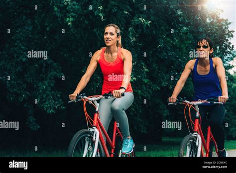 Women Riding Bicycles Hi Res Stock Photography And Images Alamy