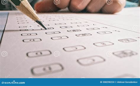 On Exam Test Person Colors Right Answers With A Pencil Filling Up Answer Sheet With