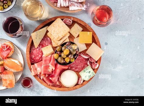 Charcuterie And Cheese Board With Wine Overhead Flat Lay Shot Stock