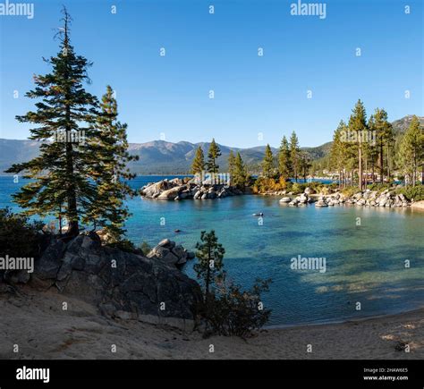 Sand Beach And Round Stones In The Water Bay At Lake Tahoe Sand