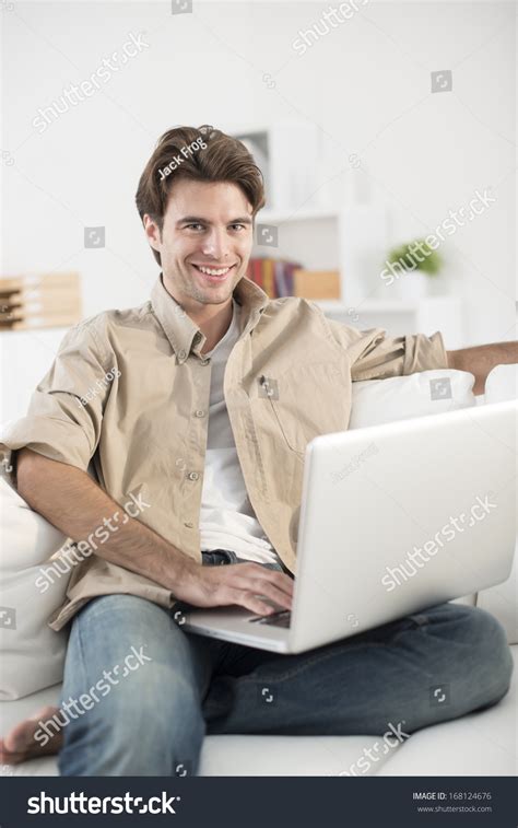 Man Sitting Couch Using Laptop Computer Stock Photo Shutterstock